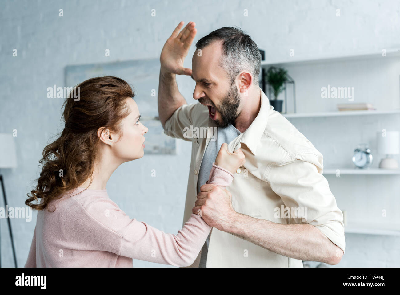 Threatening husband hi-res stock photography and images - Alamy