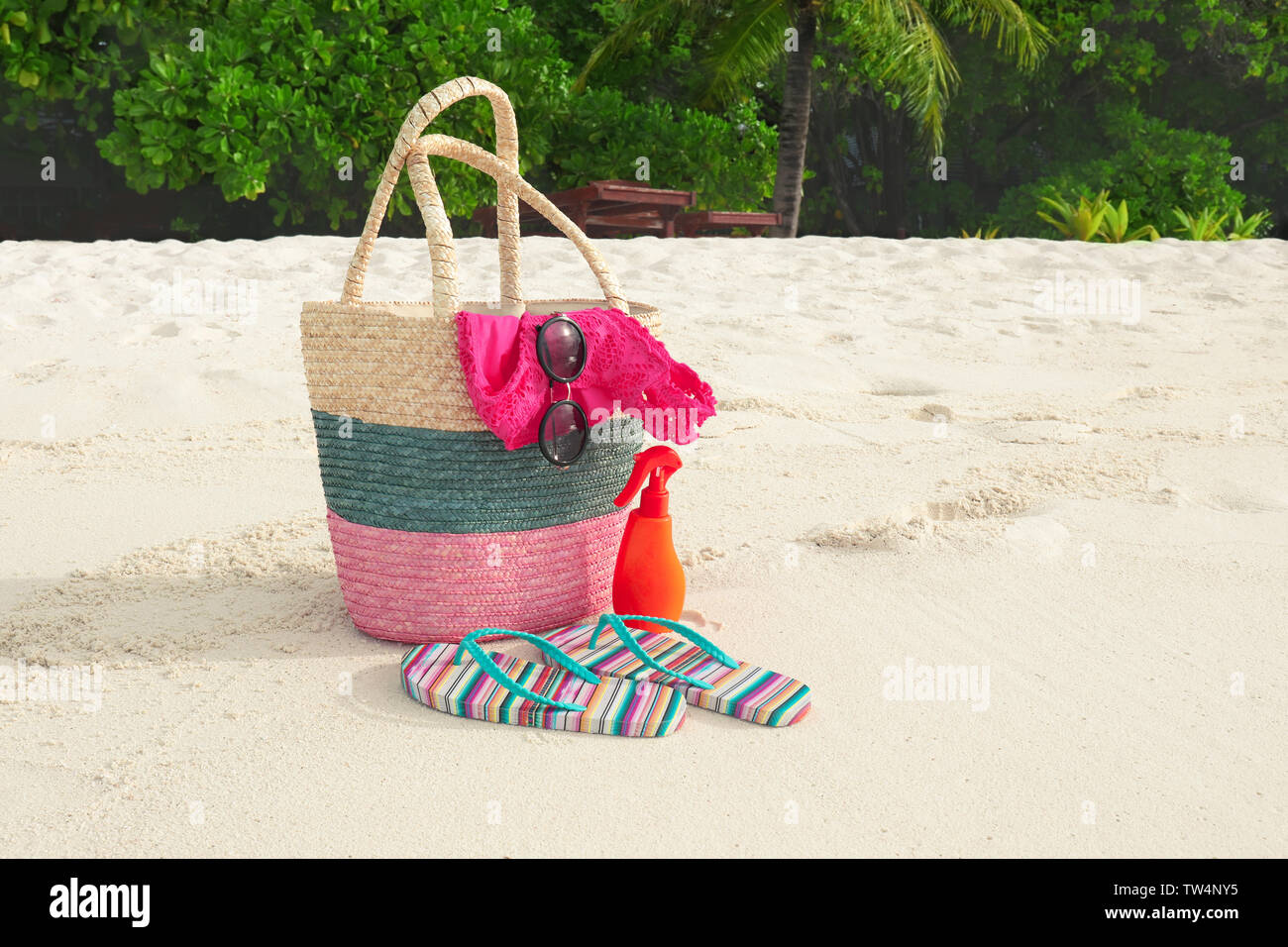 Beach accessories on sand at tropical resort Stock Photo - Alamy