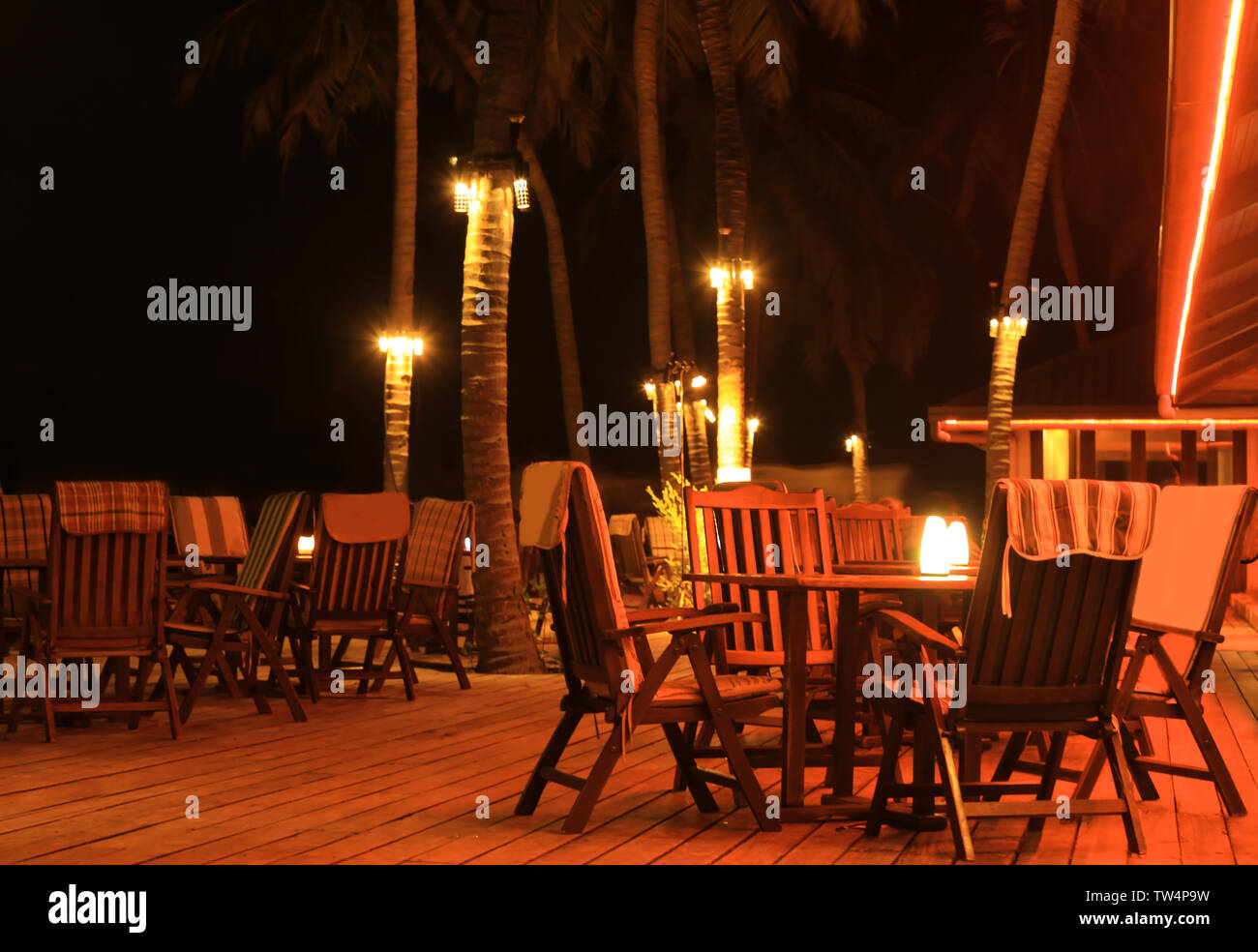 Night view of beach cafe at resort Stock Photo - Alamy