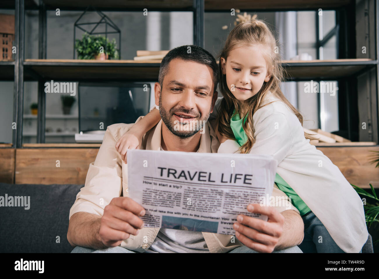 Father daughter reading newspaper hi-res stock photography and images ...