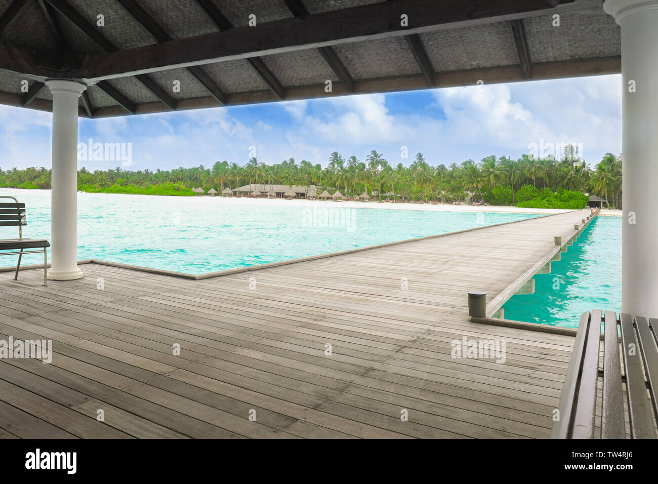 Shelter shed and wooden pontoon at sea resort on summer day Stock Photo ...