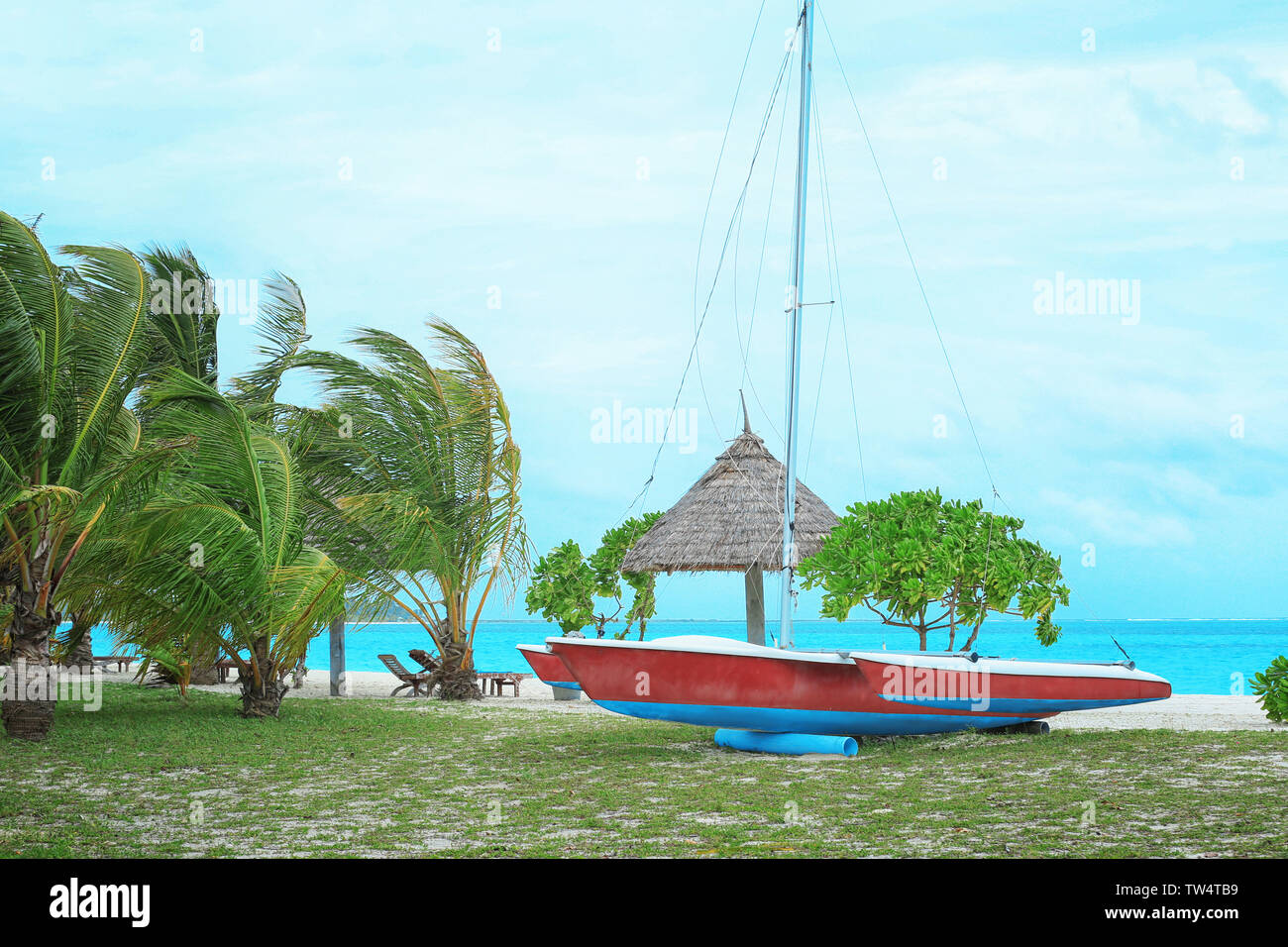 Boat on beach at sea resort Stock Photo - Alamy
