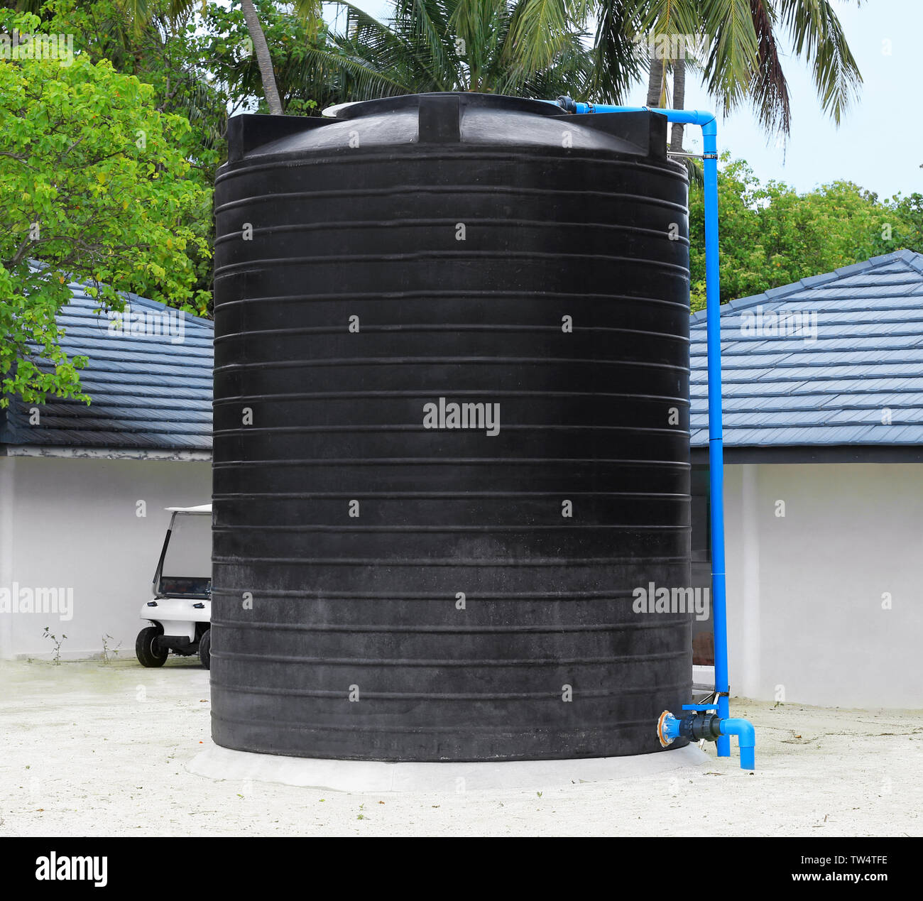 Tank for water storage at resort Stock Photo - Alamy