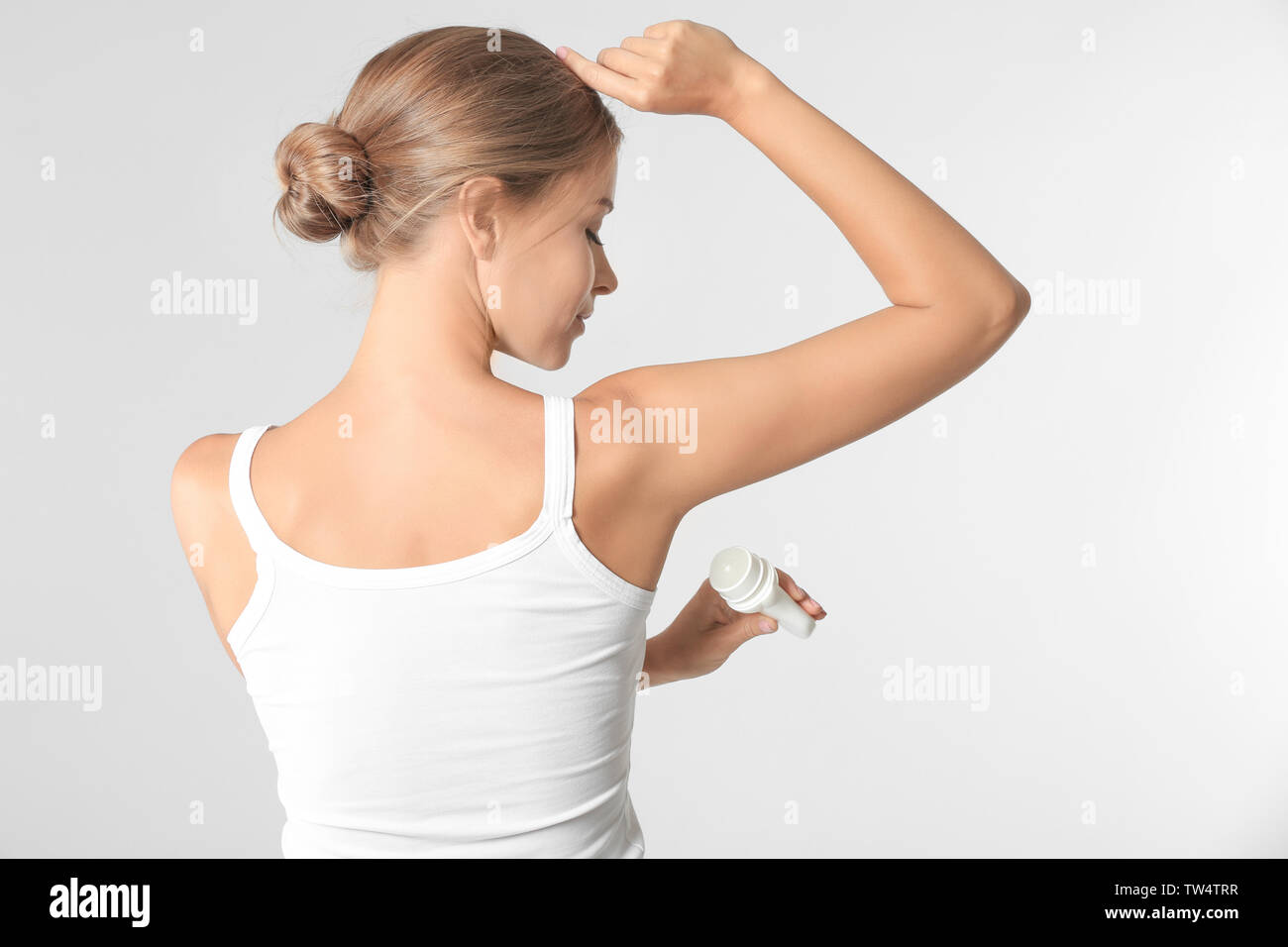 Woman apply deodorant armpits hi-res stock photography and images - Alamy