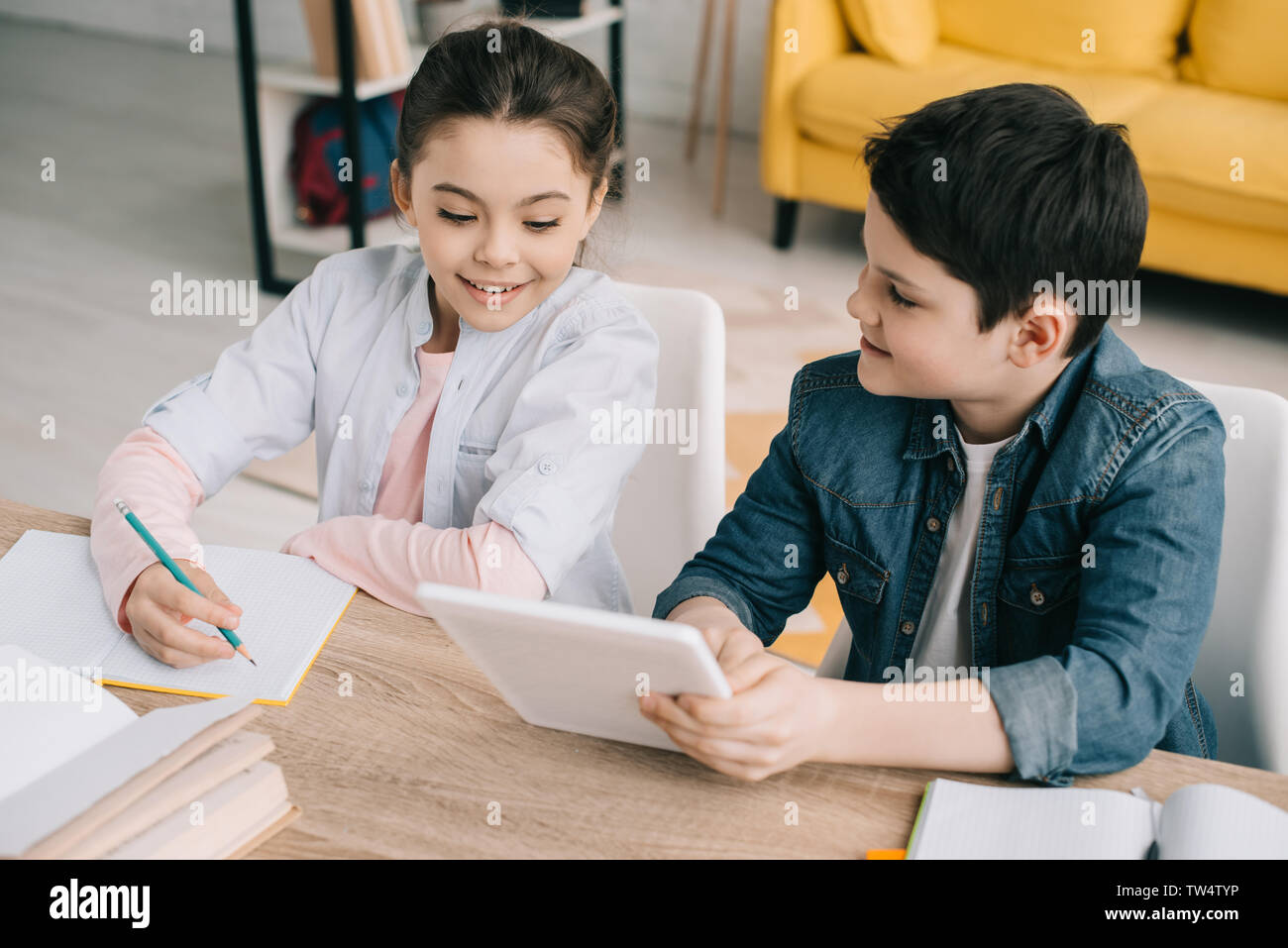 Two siting at desk hi-res stock photography and images - Alamy