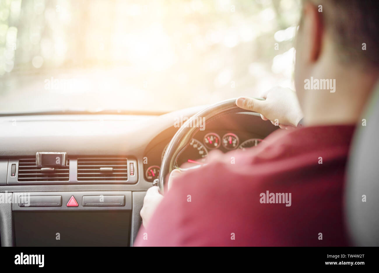 A man drives a car on the highway Stock Photo - Alamy