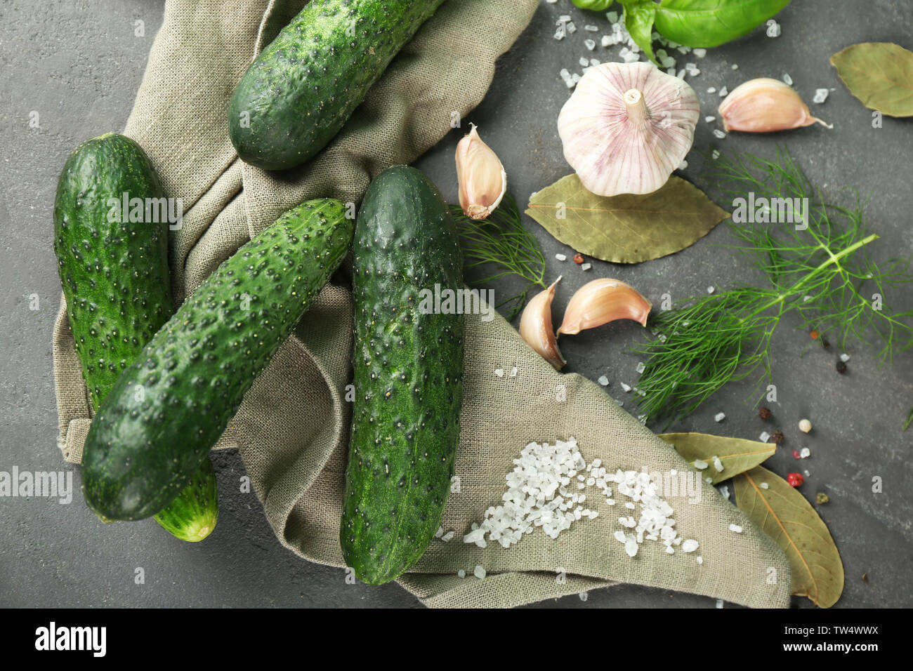 Composition with cucumbers on gray background Stock Photo - Alamy