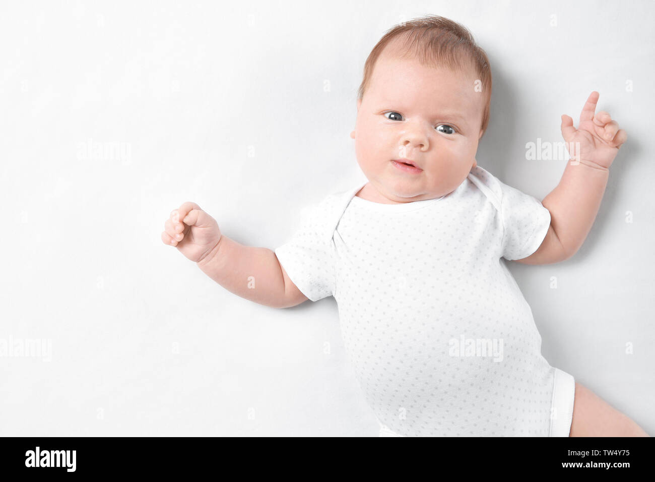 Cute newborn baby on white background Stock Photo - Alamy