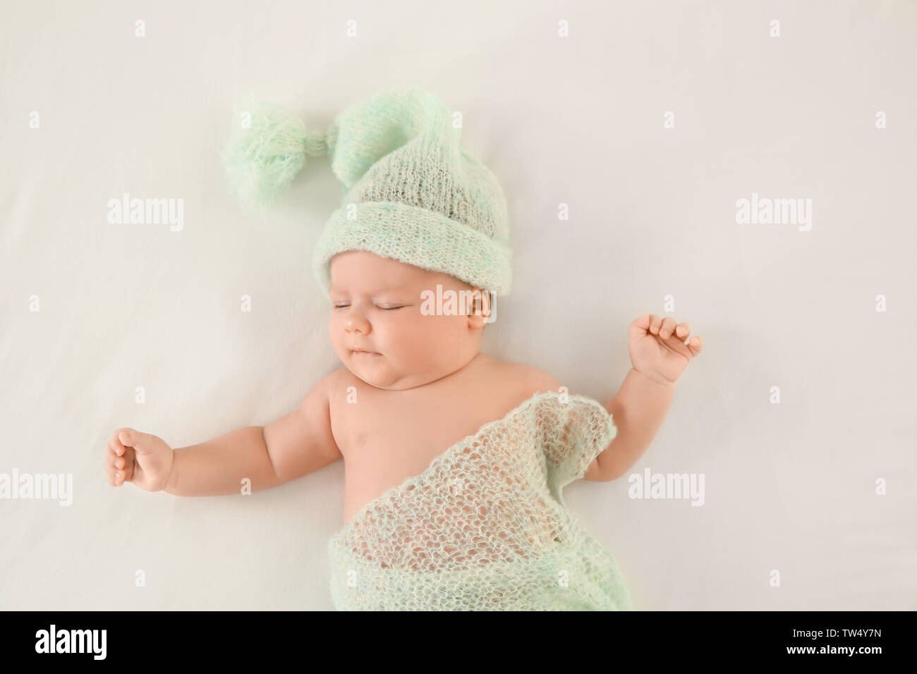 Cute newborn baby on white background Stock Photo - Alamy