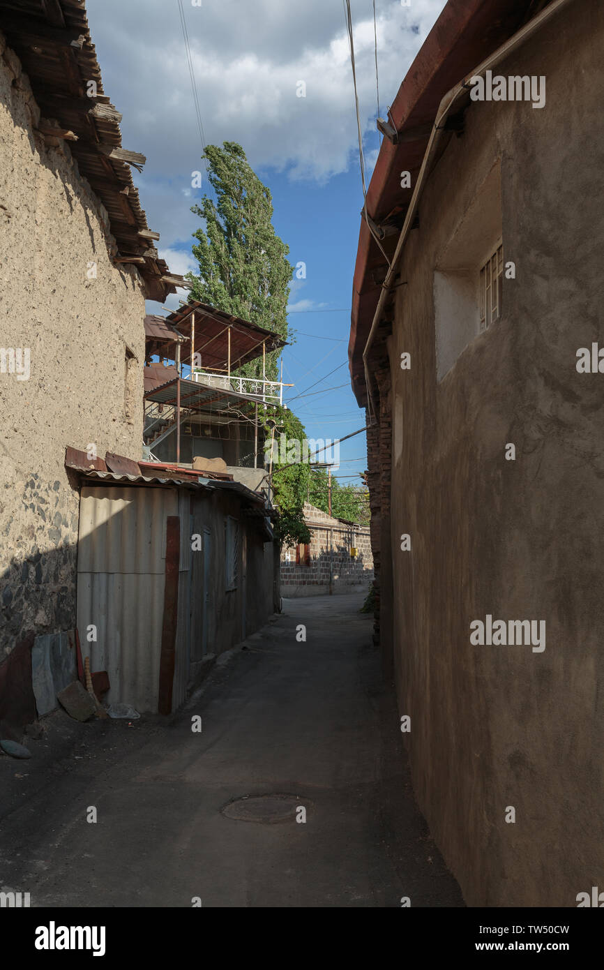 lane between stone houses in the daytime Stock Photo - Alamy