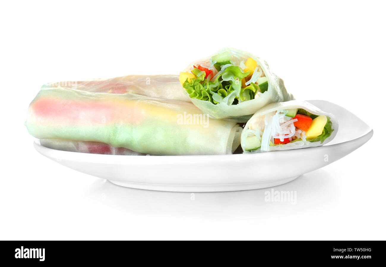 Plate with portion of spring rolls on white background Stock Photo - Alamy