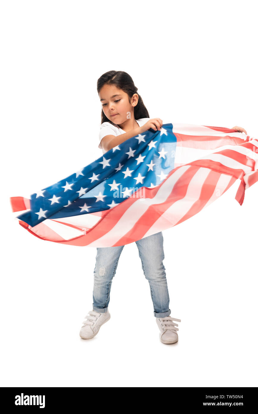latin kid in denim jeans standing with american flag isolated on white ...
