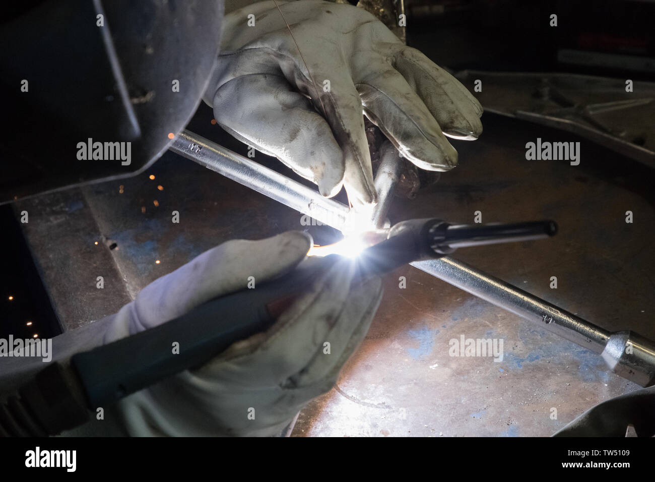 hands of the welder solder and connect the parts Stock Photo - Alamy