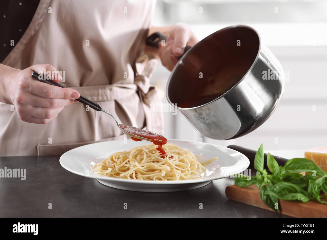 Adding sauce sauces hi-res stock photography and images - Alamy