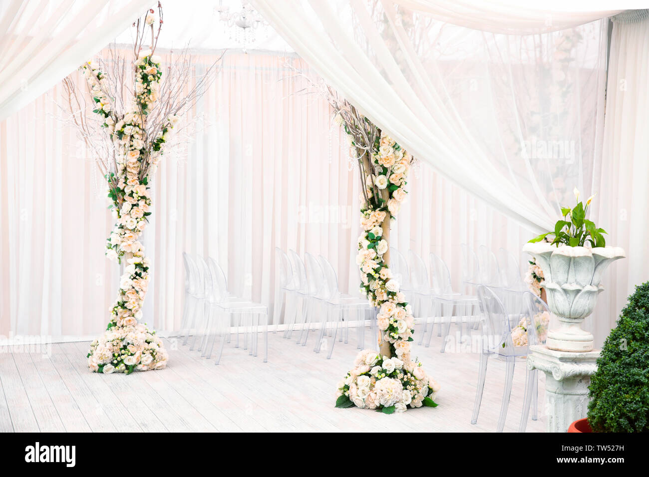 Beautiful wedding hall decorated with flowers and fabric Stock Photo ...