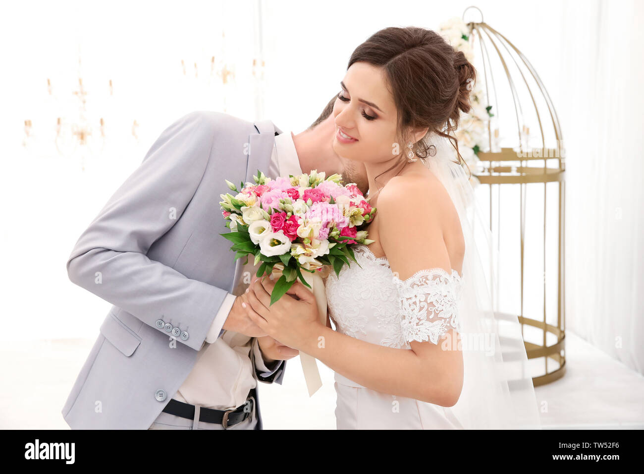 Happy beautiful couple on wedding day, indoors Stock Photo - Alamy