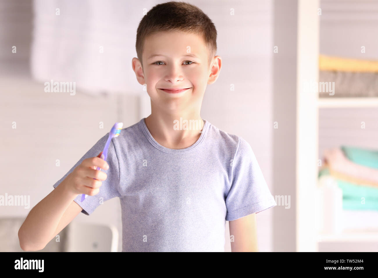 Cute little boy with toothbrush at home. Cleaning teeth concept Stock ...