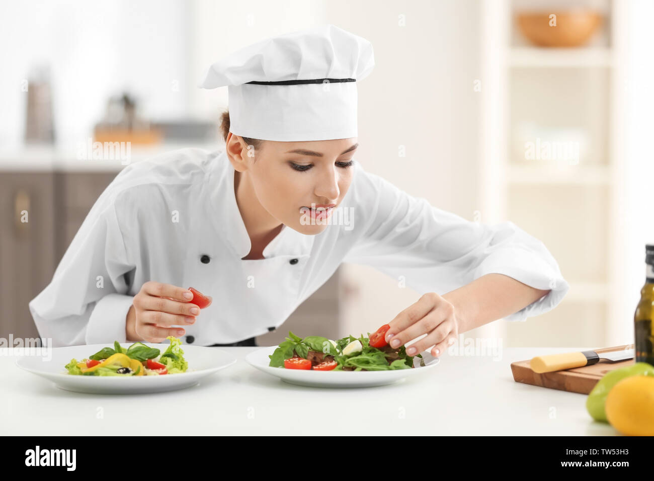 Cuisine woman young dishes hi-res stock photography and images - Alamy