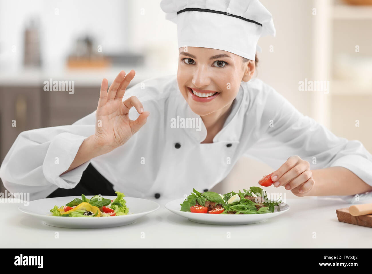 Cuisine woman young dishes hi-res stock photography and images - Alamy