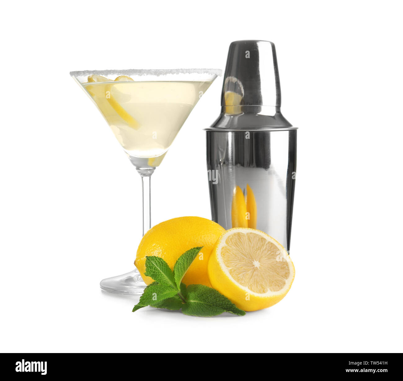 Glass of lemon drop martini, shaker and fruit on white background Stock ...