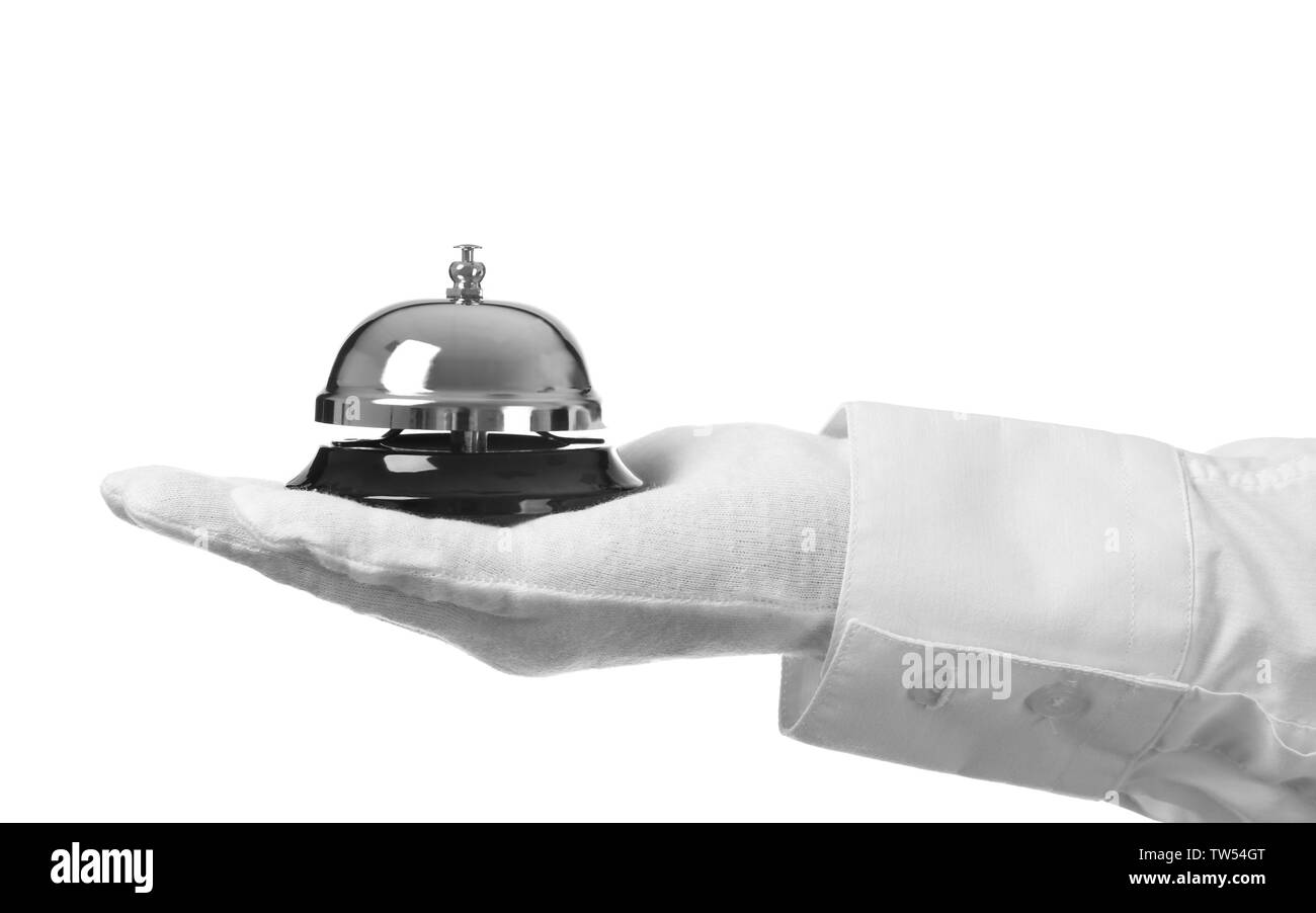 Man holding bell on white background Stock Photo - Alamy