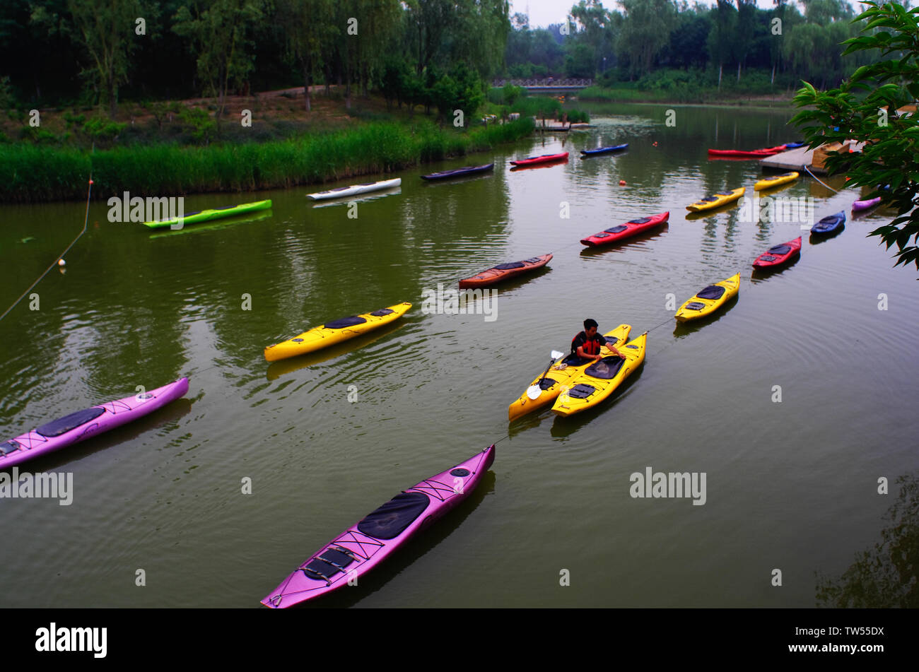Lake rowing boat color Stock Photo - Alamy