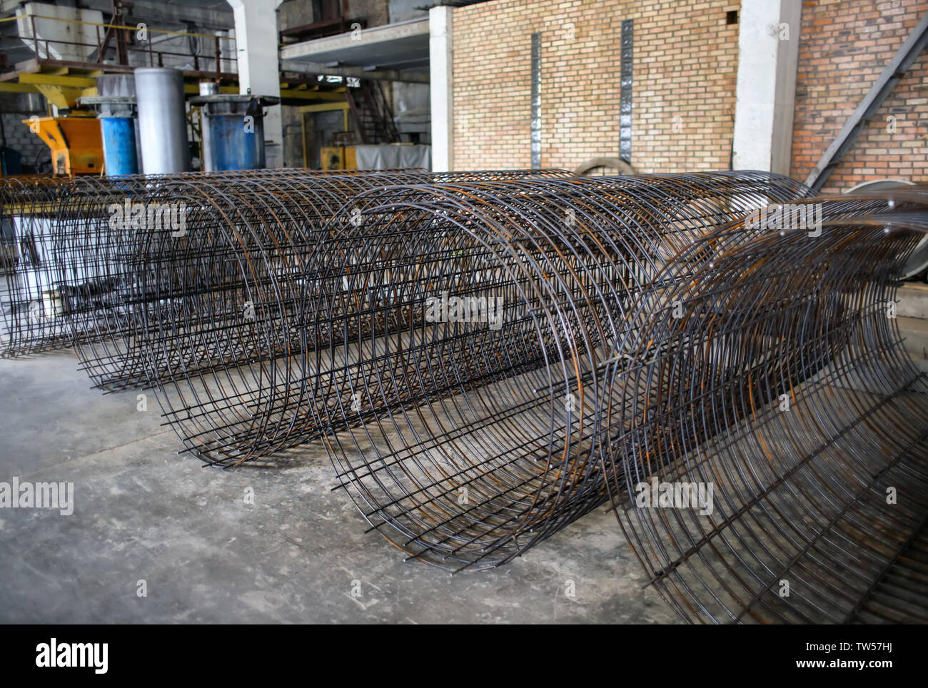 Metal frames in workshop of concrete batching plant Stock Photo - Alamy