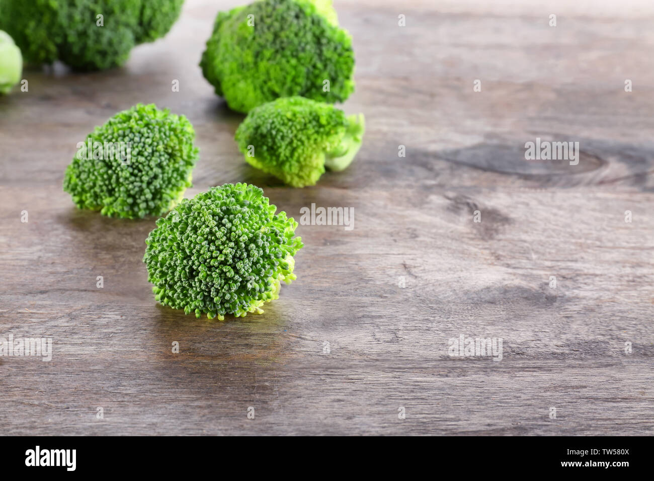 Fresh green broccoli on table Stock Photo - Alamy