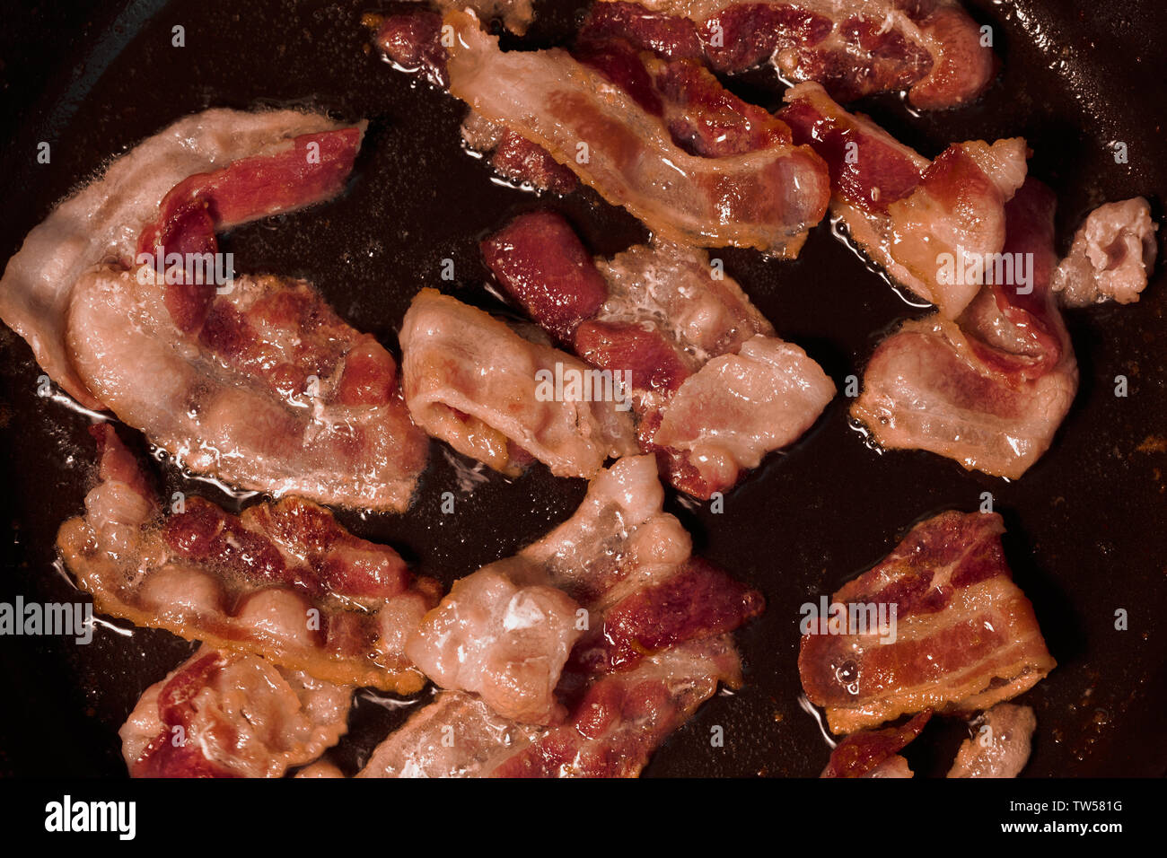 Crispy bacon cooking closeup hi-res stock photography and images - Alamy