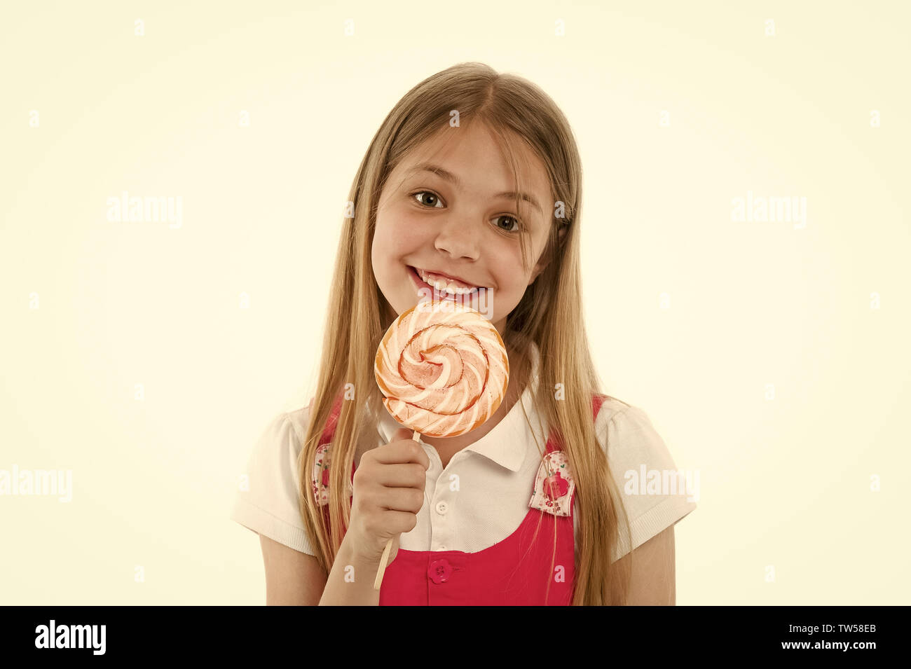 I need treat. Girl cute smiling face holds sweet lollipop. Sweets in ...