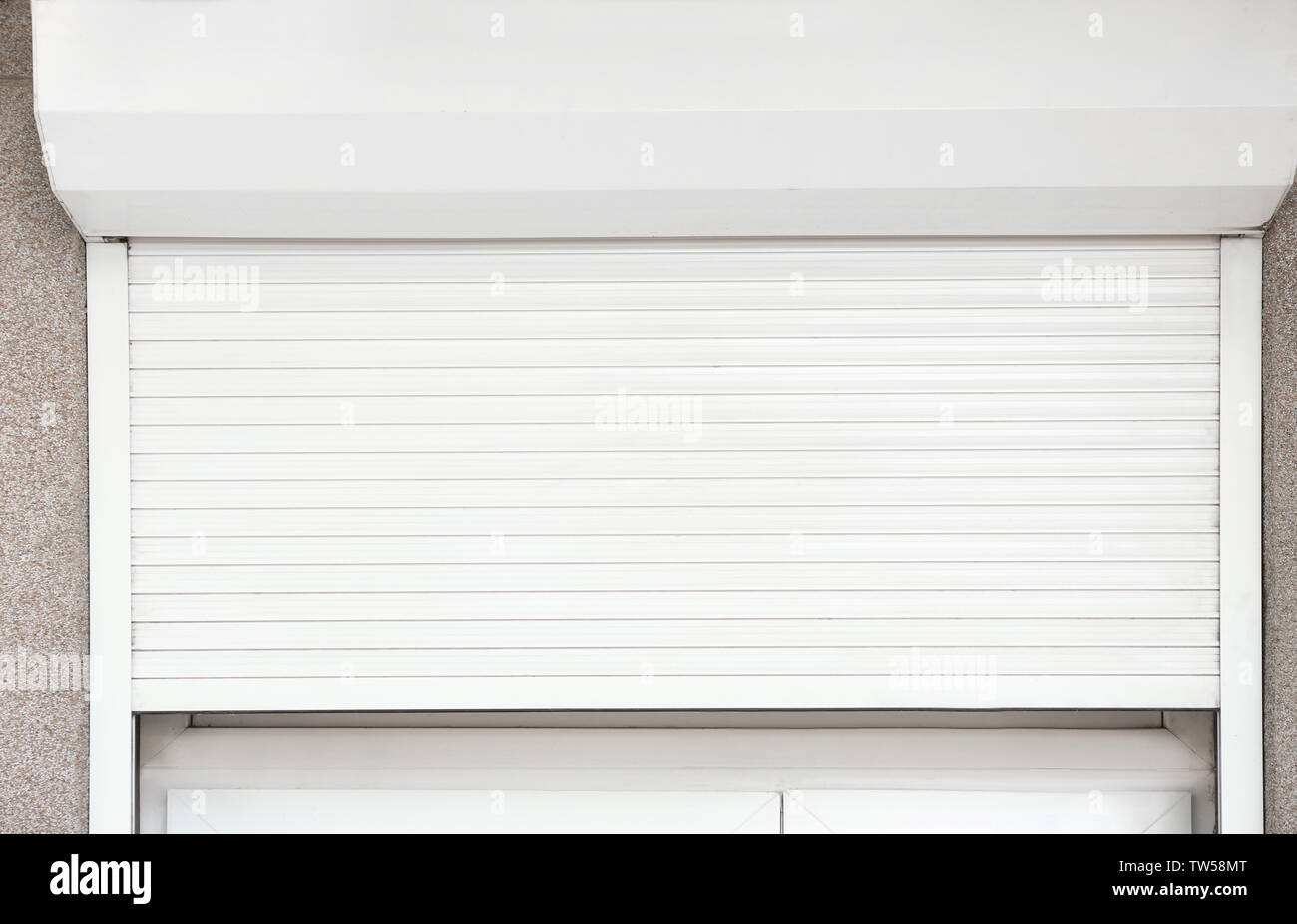 Window with half-closed roller shutter, closeup Stock Photo - Alamy