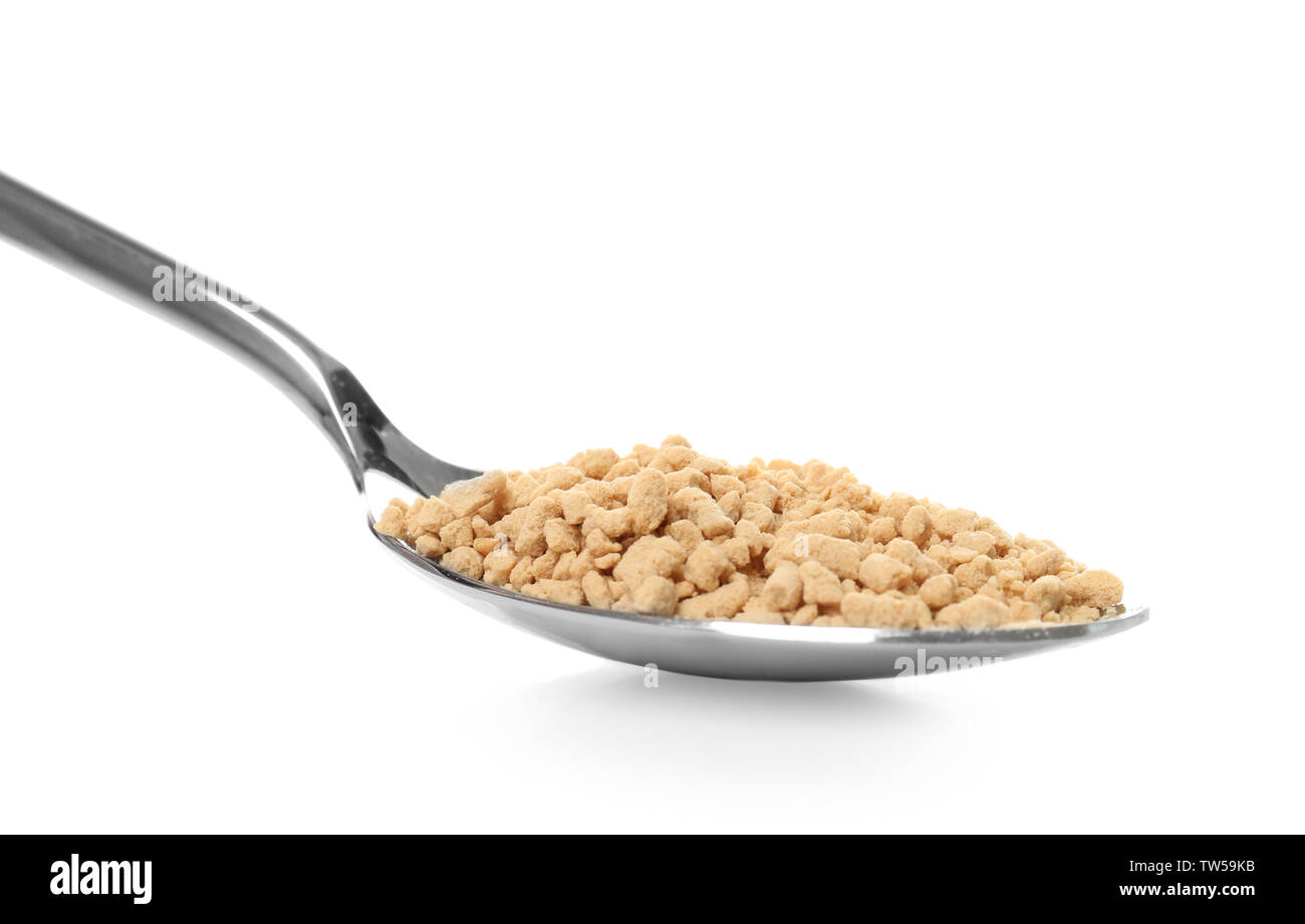 Spoon with superfood powder on white background Stock Photo - Alamy