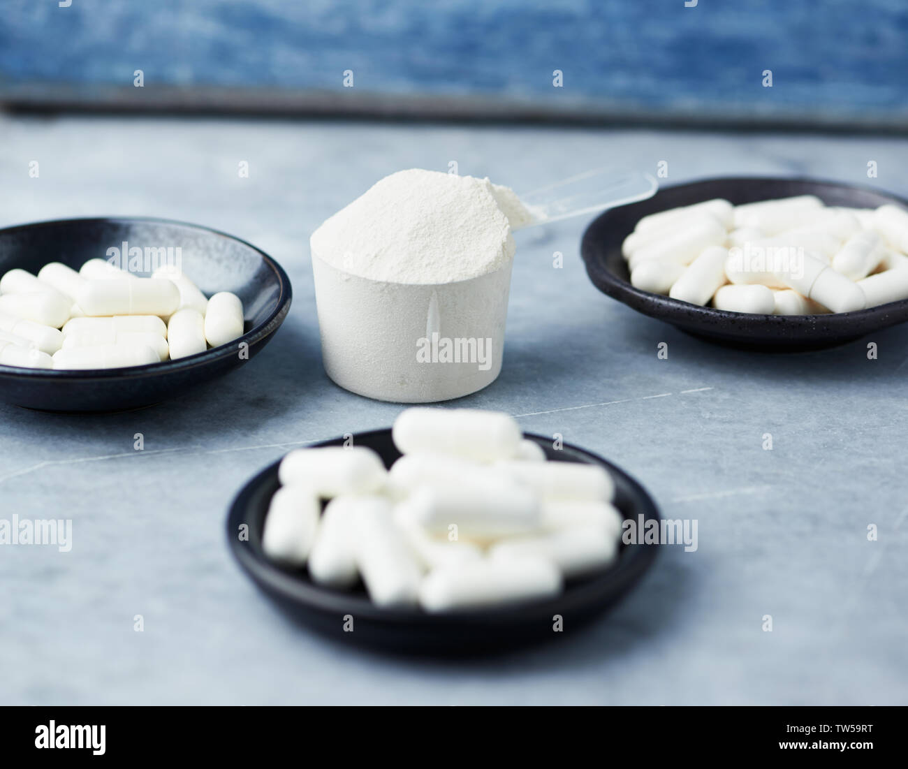 Creatine, Beta-alanine, Taurine capsules and a Scoop of Whey Protein ...