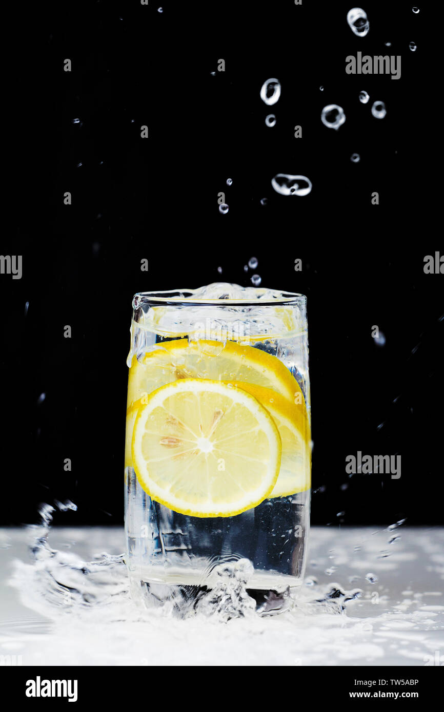 Splash clear lemonade Stock Photo - Alamy