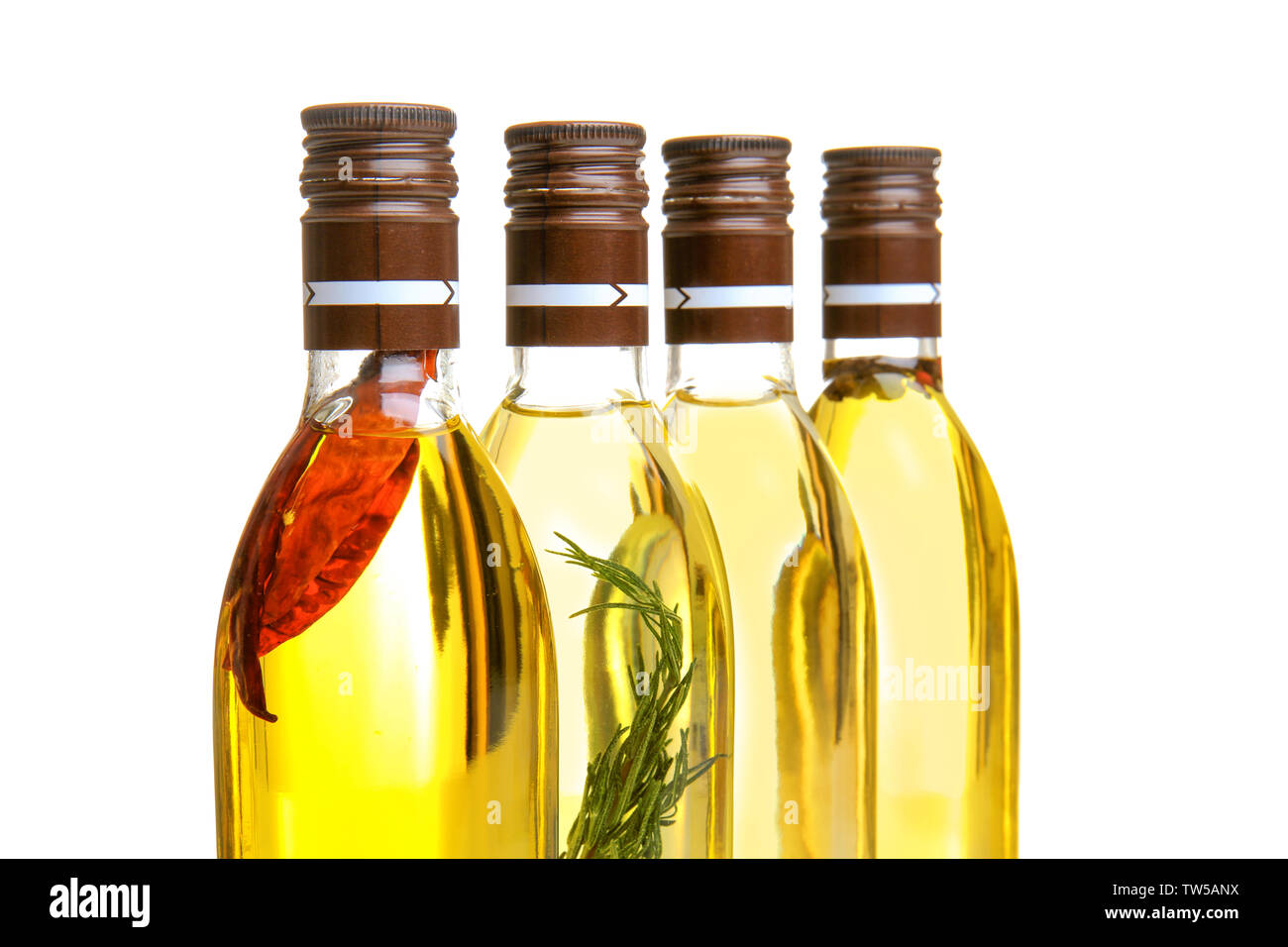 Bottles of cooking oil, isolated on white Stock Photo - Alamy
