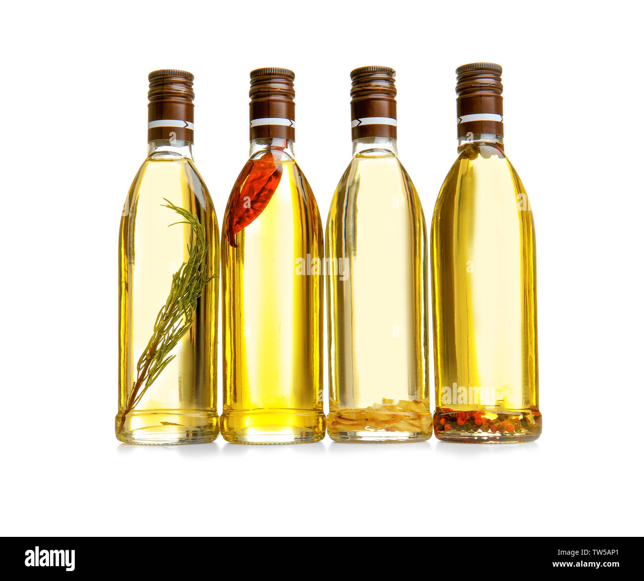 Bottles of cooking oil, isolated on white Stock Photo - Alamy