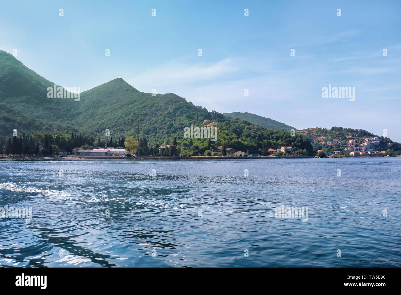 Beautiful view with small city on seashore Stock Photo - Alamy