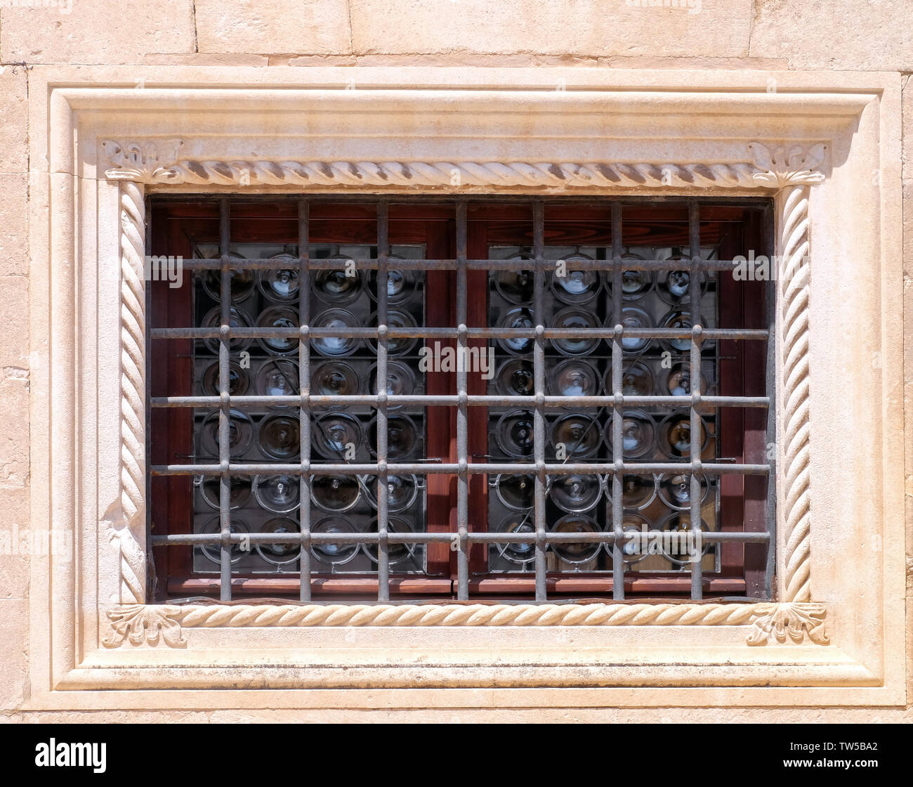 Vintage window with lattice of old stone house Stock Photo - Alamy