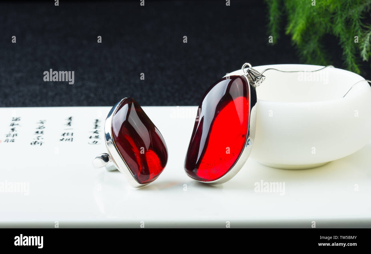 Blood amber jewelry Stock Photo - Alamy