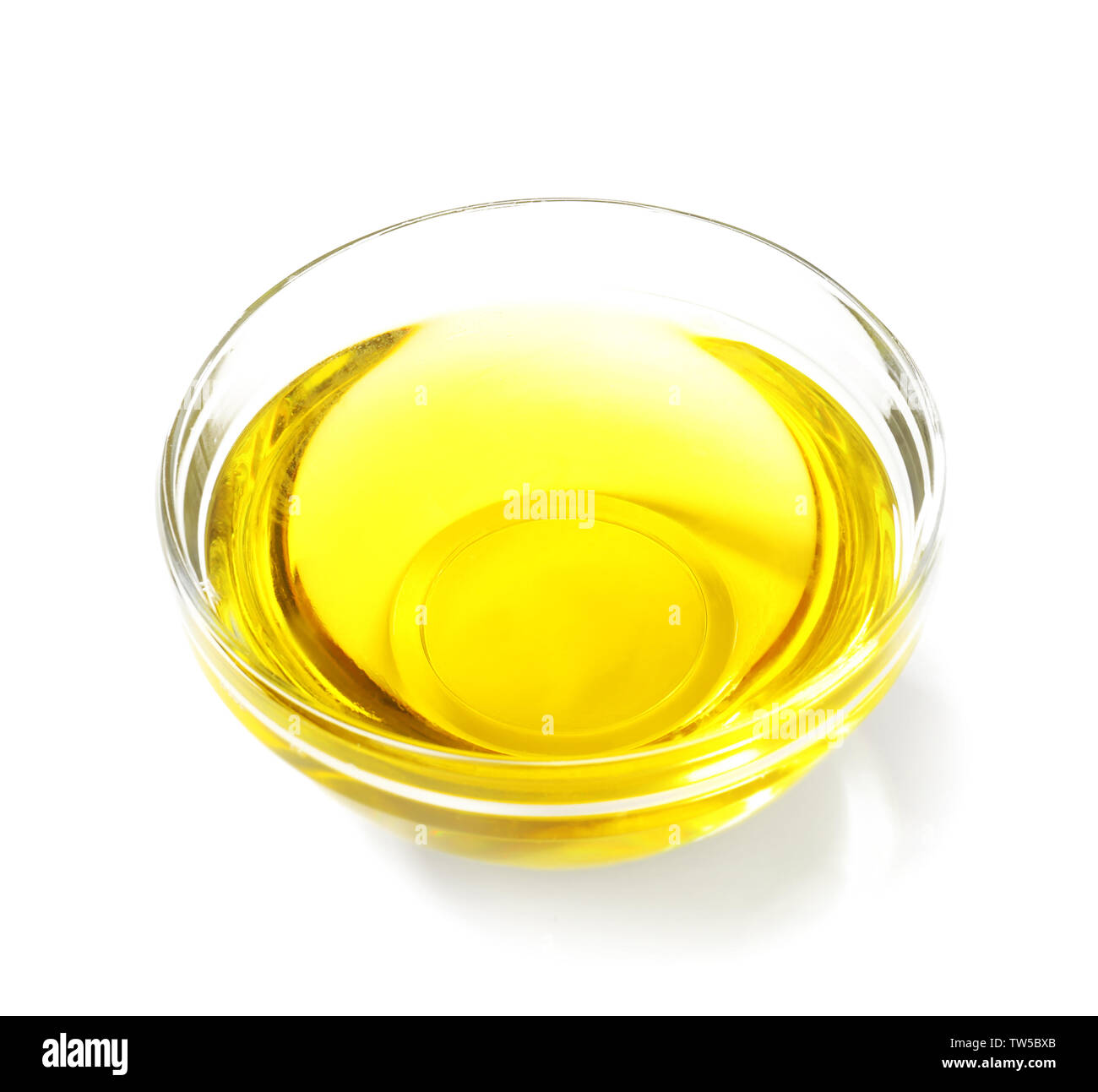 Glass bowl with cooking oil on white background Stock Photo - Alamy