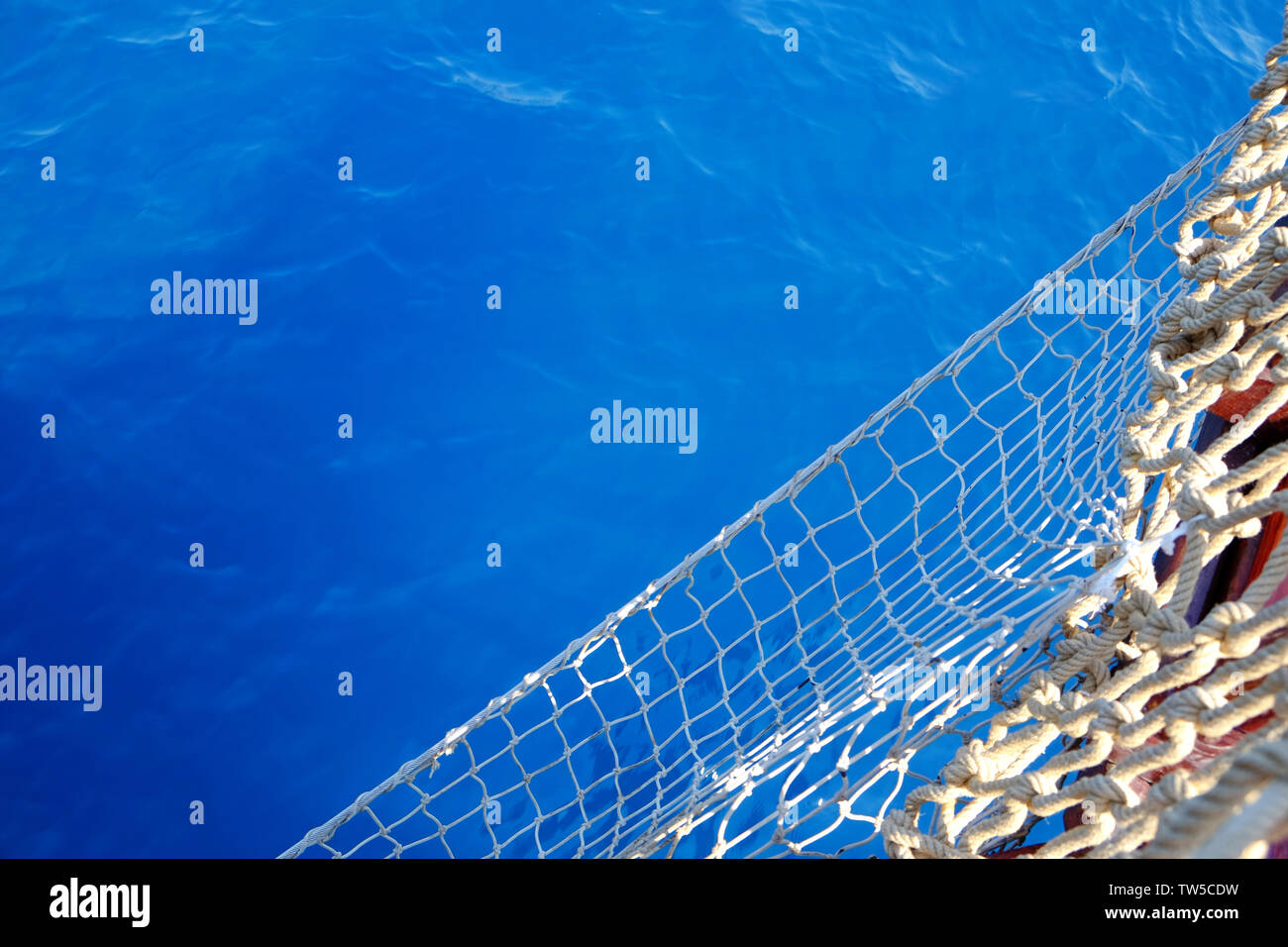 Beautiful view of water and nets from ship Stock Photo - Alamy