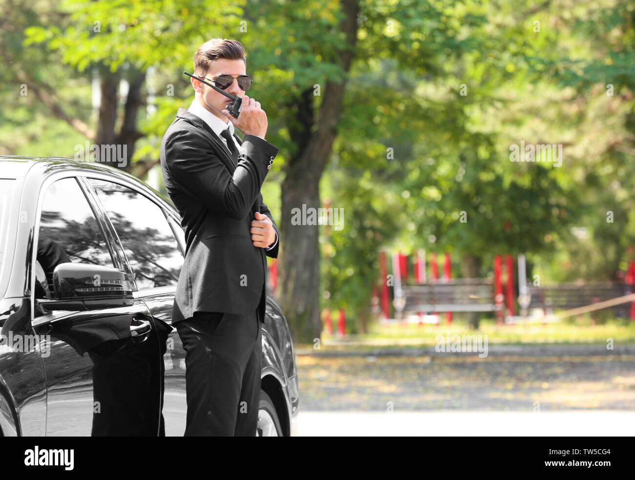 Handsome bodyguard hi-res stock photography and images - Alamy
