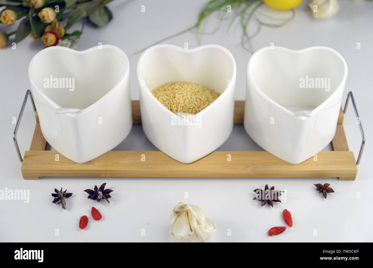 Heart-shaped ceramic saucer in the kitchen Stock Photo - Alamy