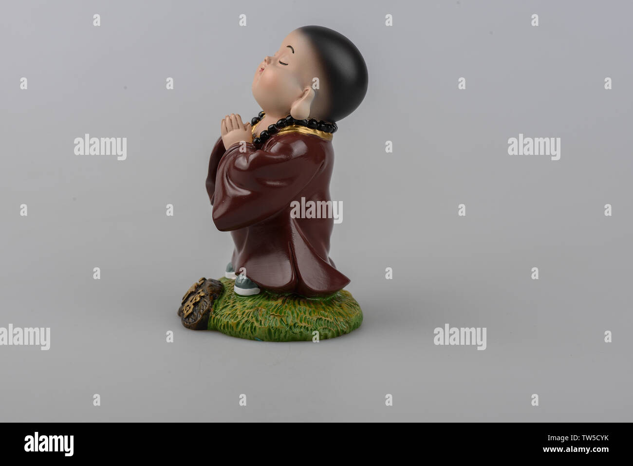 Little monk car furnishings Stock Photo - Alamy