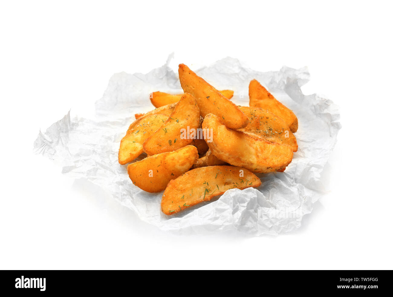 Delicious baked potato wedges on white background Stock Photo - Alamy