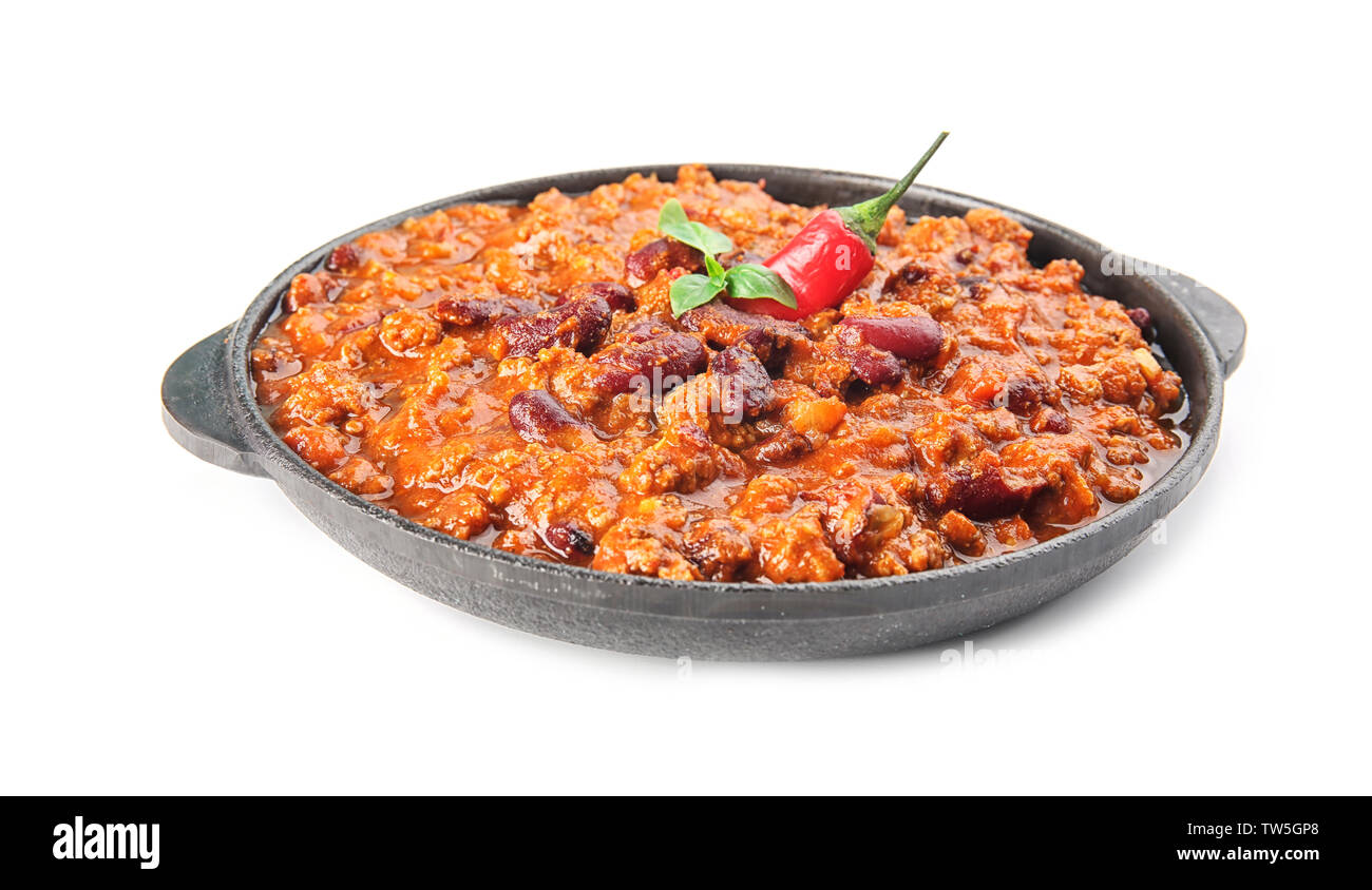 Chili con carne in frying pan on white background Stock Photo - Alamy