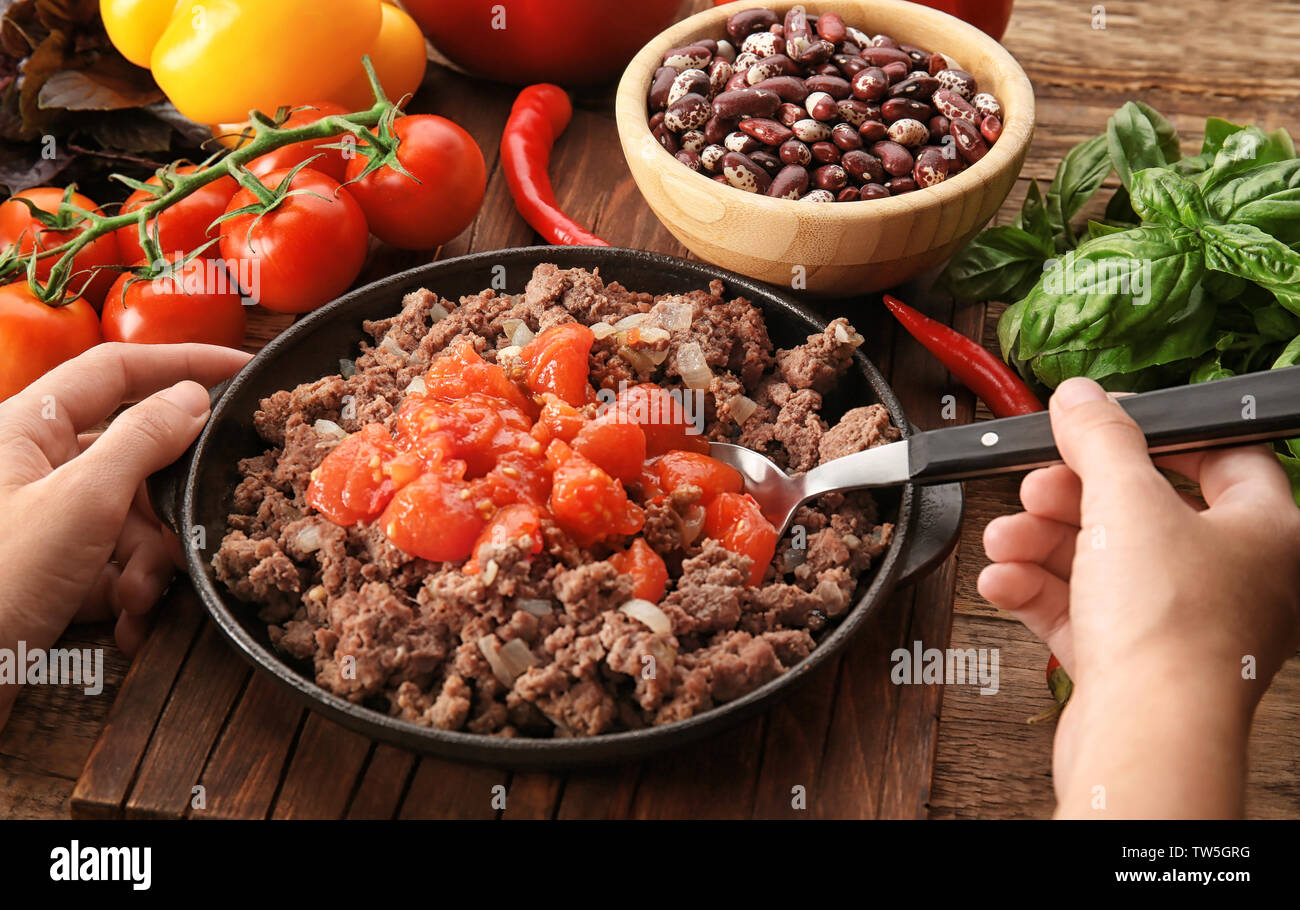 Adding tomato hi-res stock photography and images - Alamy