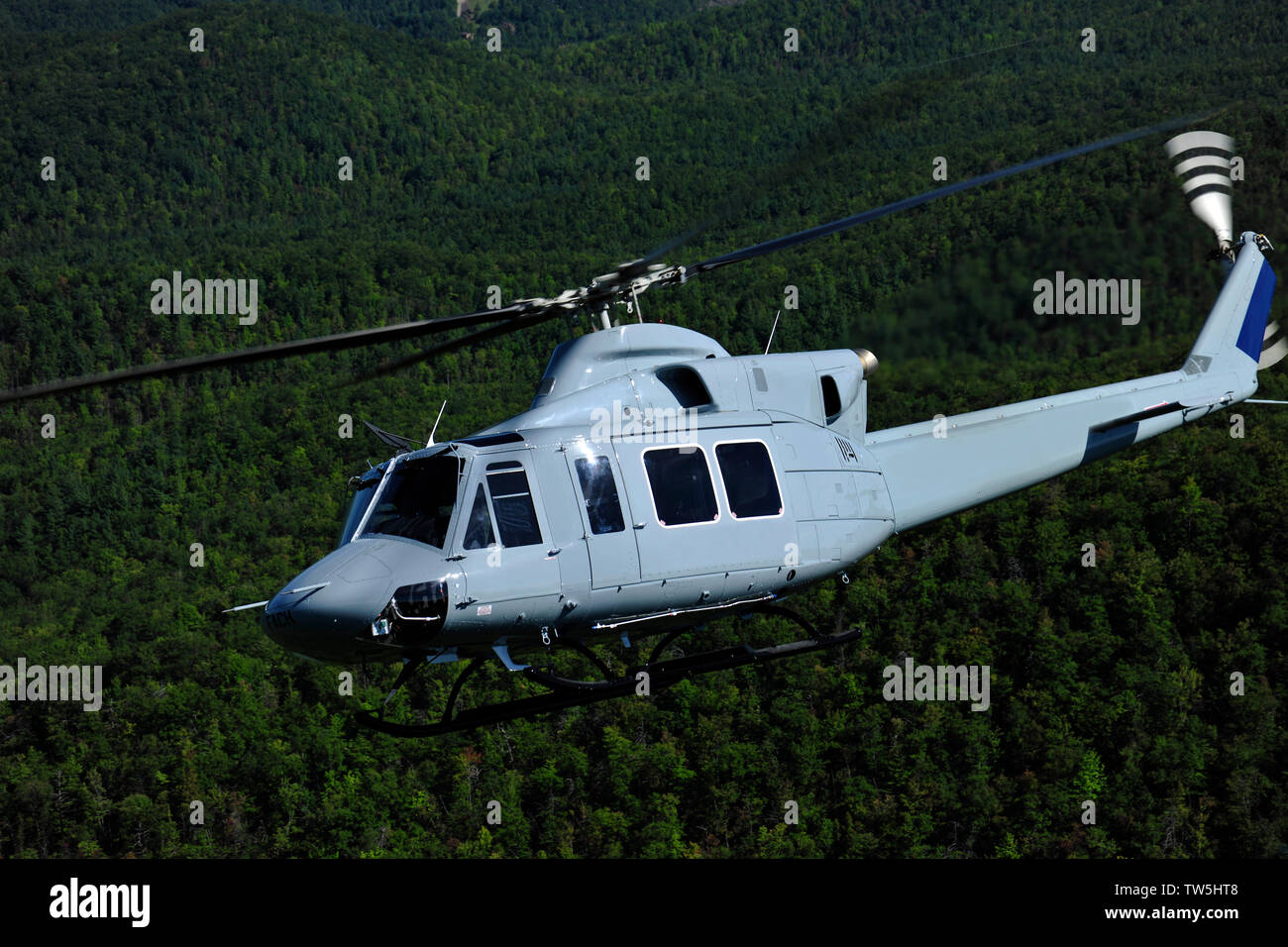 Corporate, Executive, military and law enforcement helicopter in flight ...