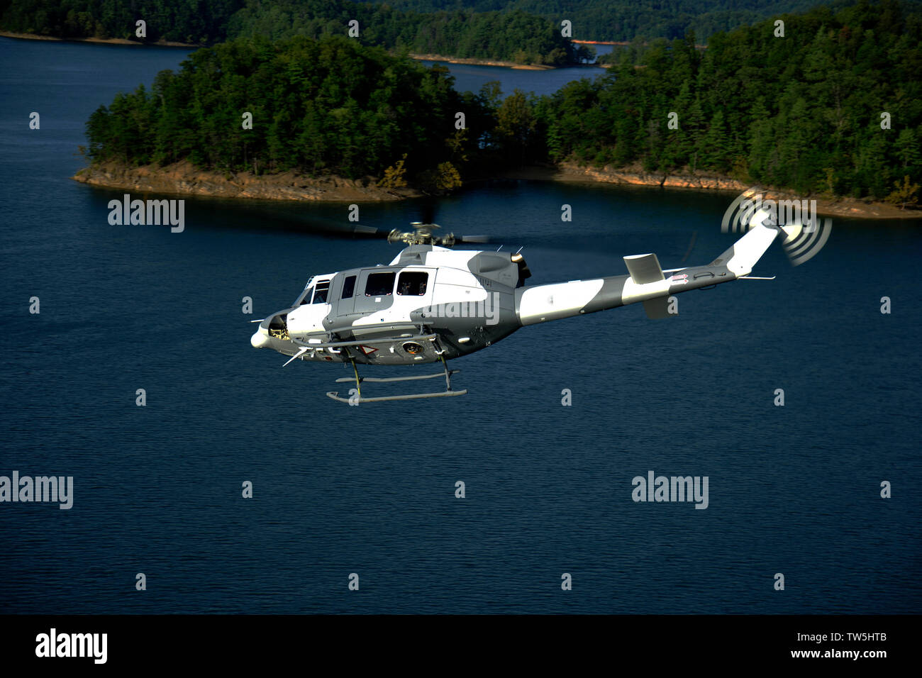 Corporate, Executive, military and law enforcement helicopter in flight ...