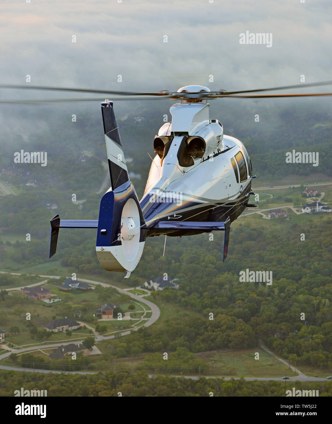 Corporate, Executive, military and law enforcement helicopter in flight ...